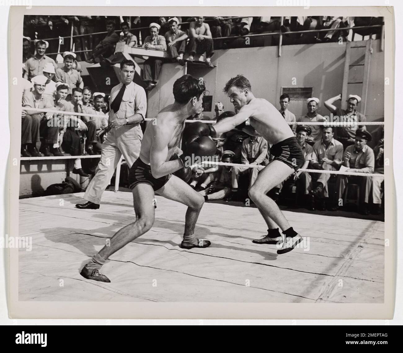 Two Coast Guard boxers, Harold E. Schwartz and Daniel O'Brien, spar on ...