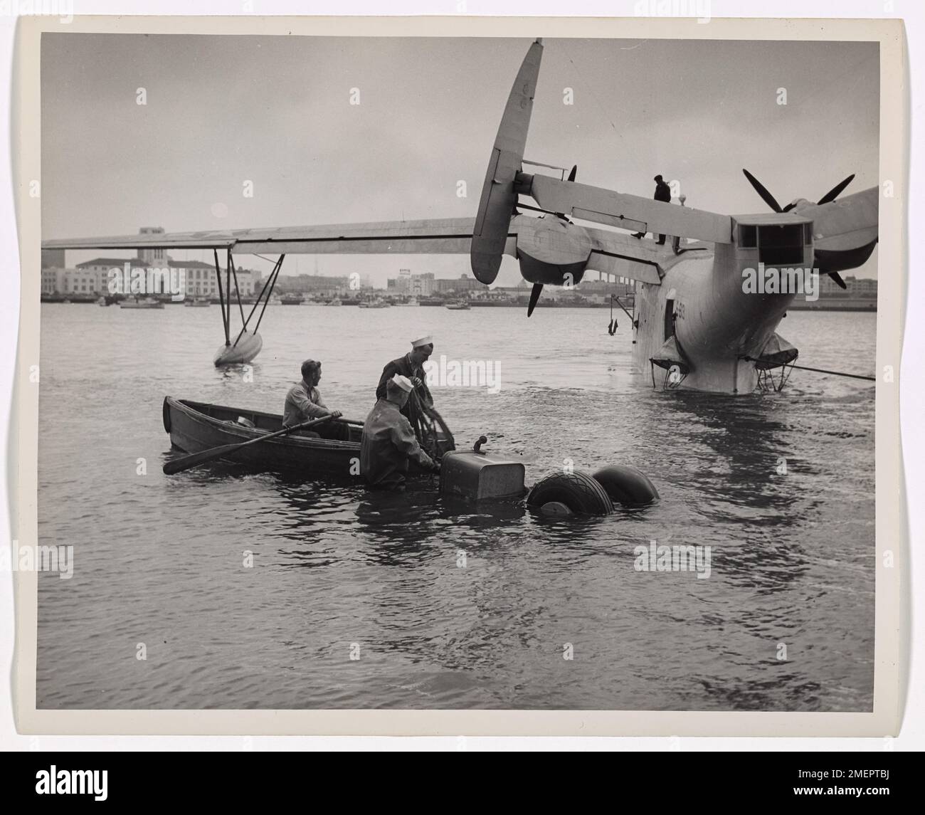 A Coast Guard rescue plane successfully evacuates a Navy sailor ...