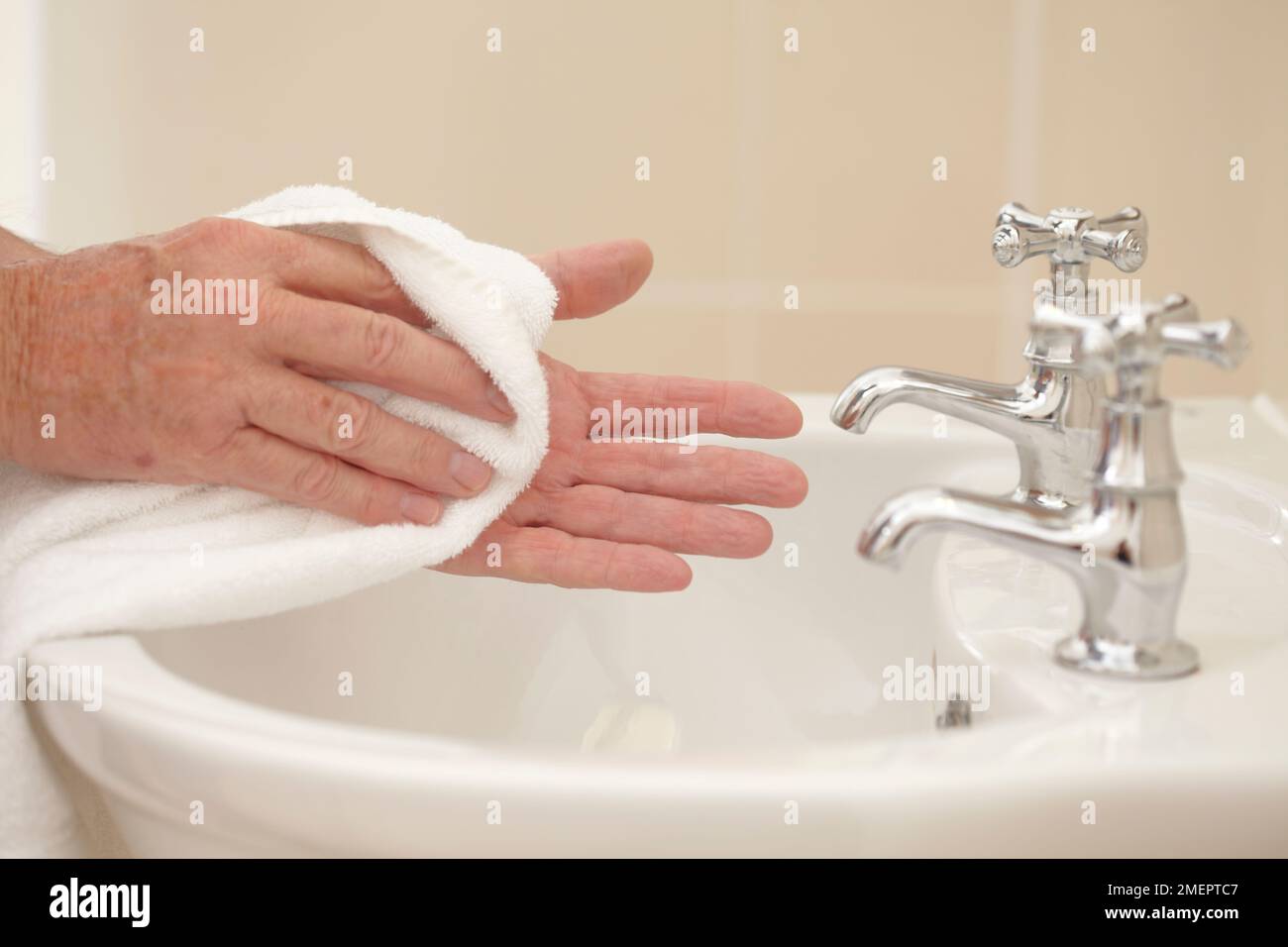 Drying hands hi-res stock photography and images - Alamy