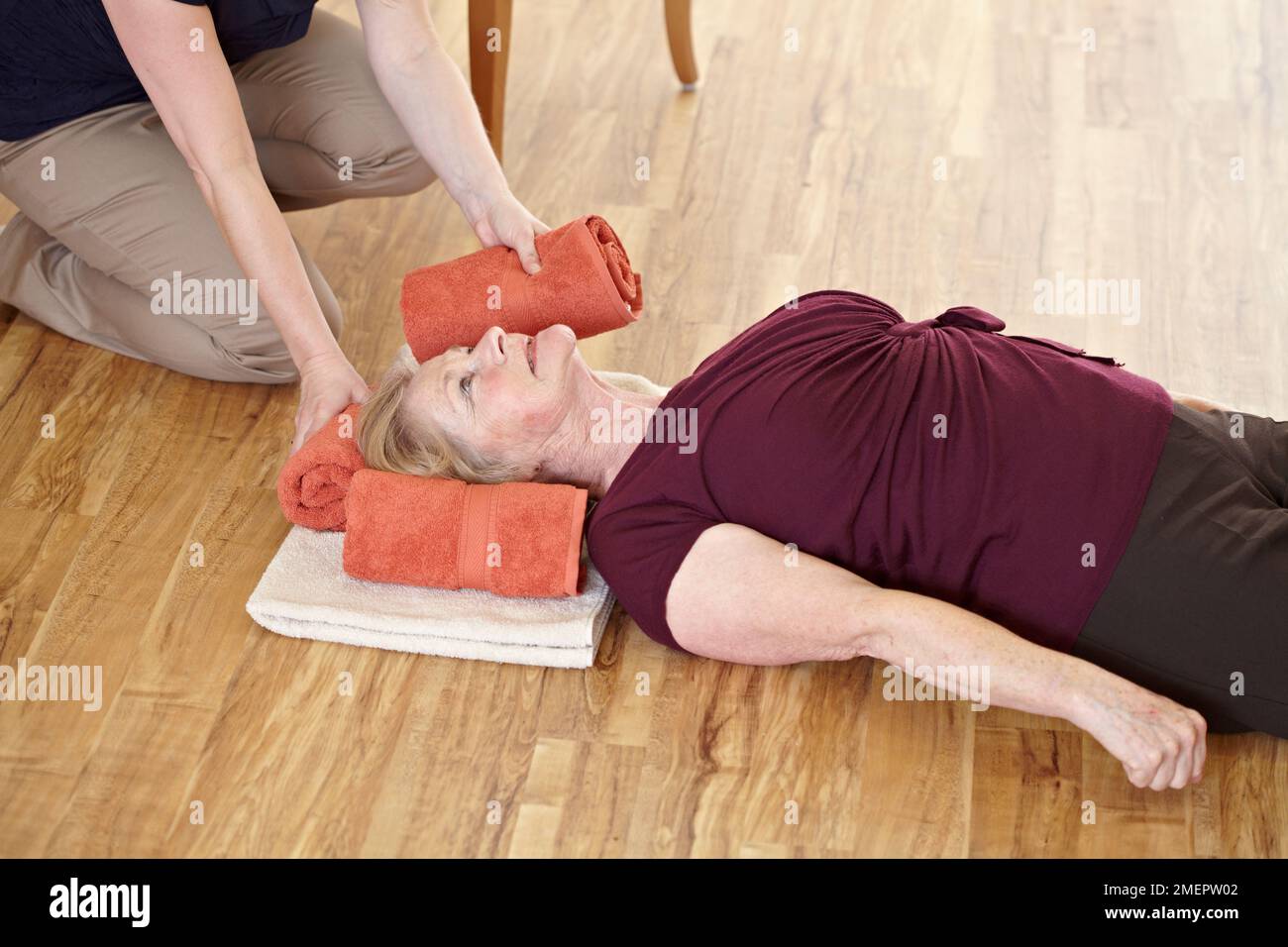 Seizures, placing soft padding, rolled towels around head for ...