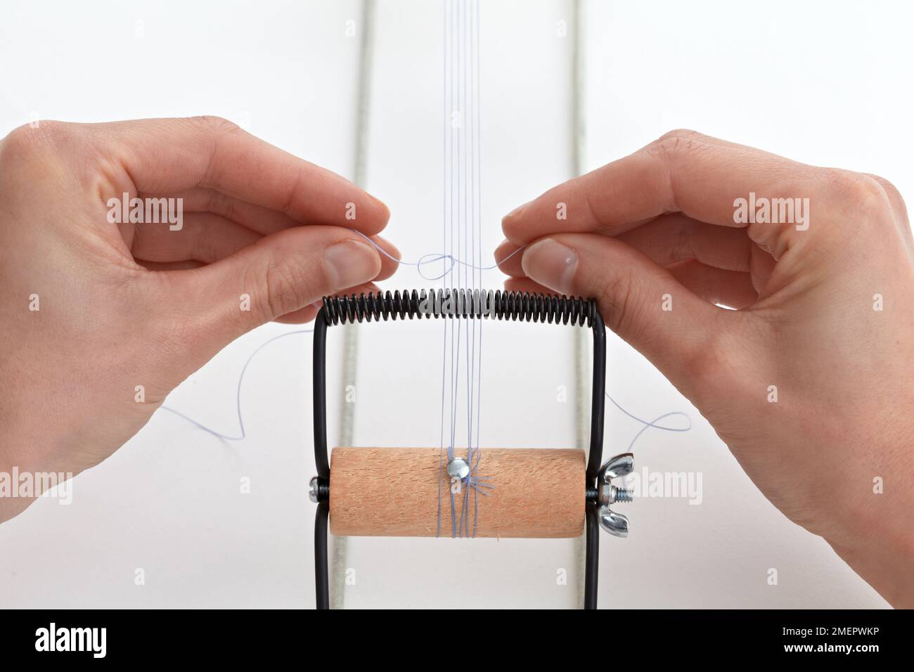 Hand holding beads hi-res stock photography and images - Alamy