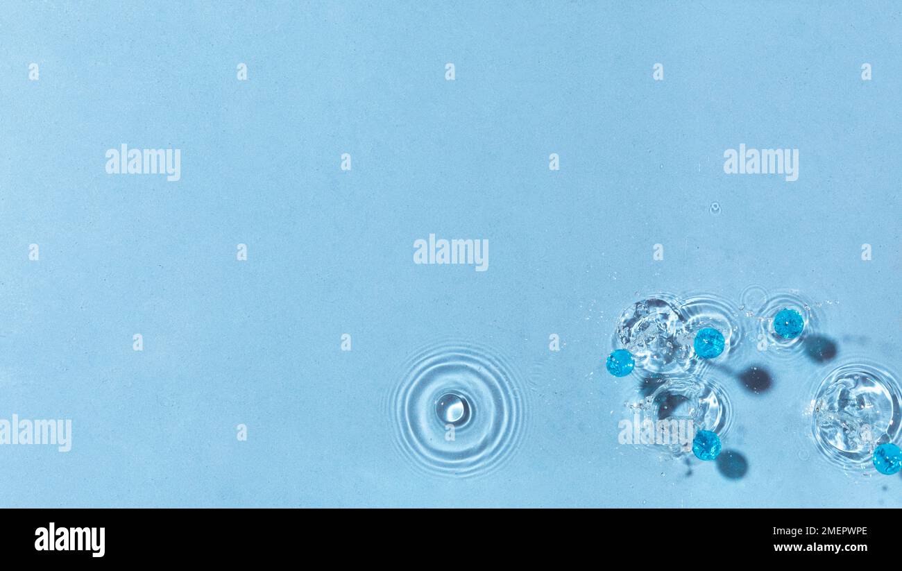 Abstract water, cosmetic background with waves and ripples and granules ...