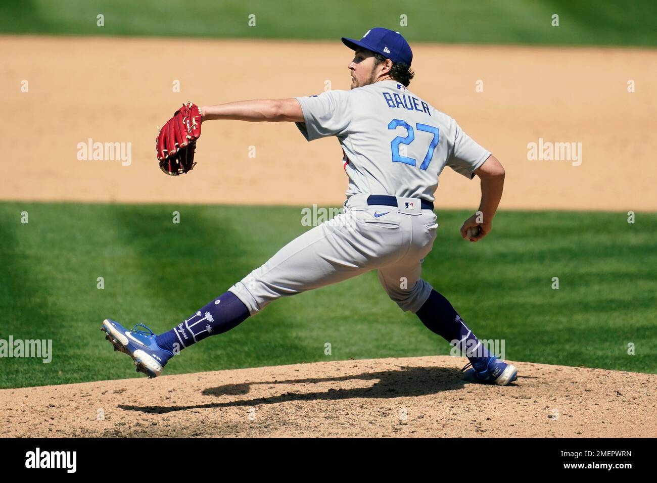 Los Angeles Dodgers pitcher Trevor Bauer (27) throws against the ...