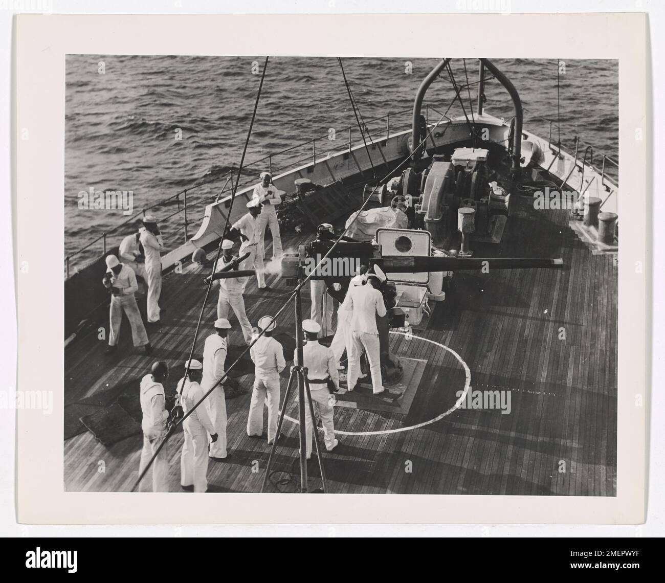 A ship conducts target practice during short-range firing drills. The ...