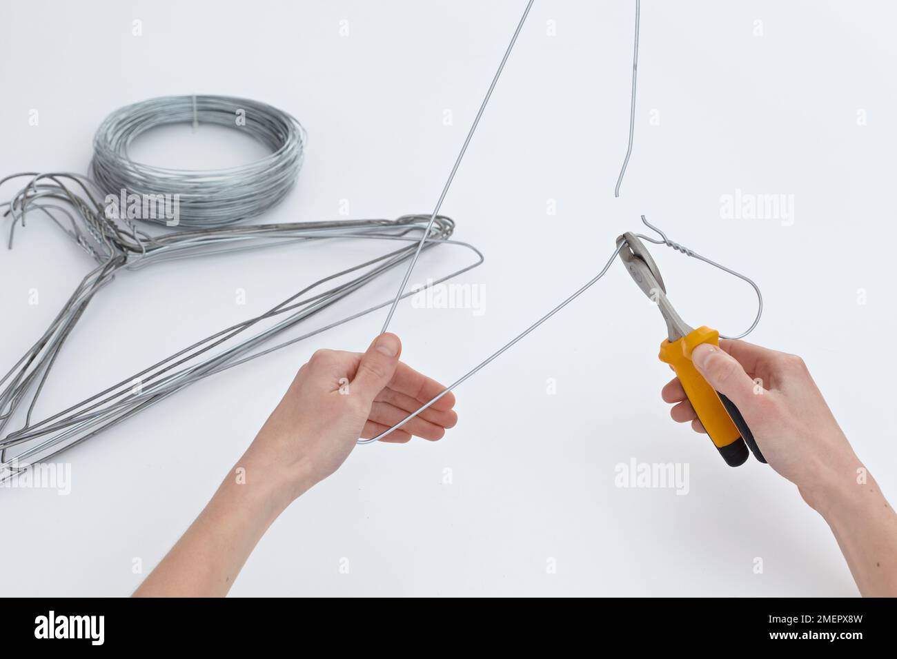 Making wire chandelier, cutting off hanging loop using small bolt ...