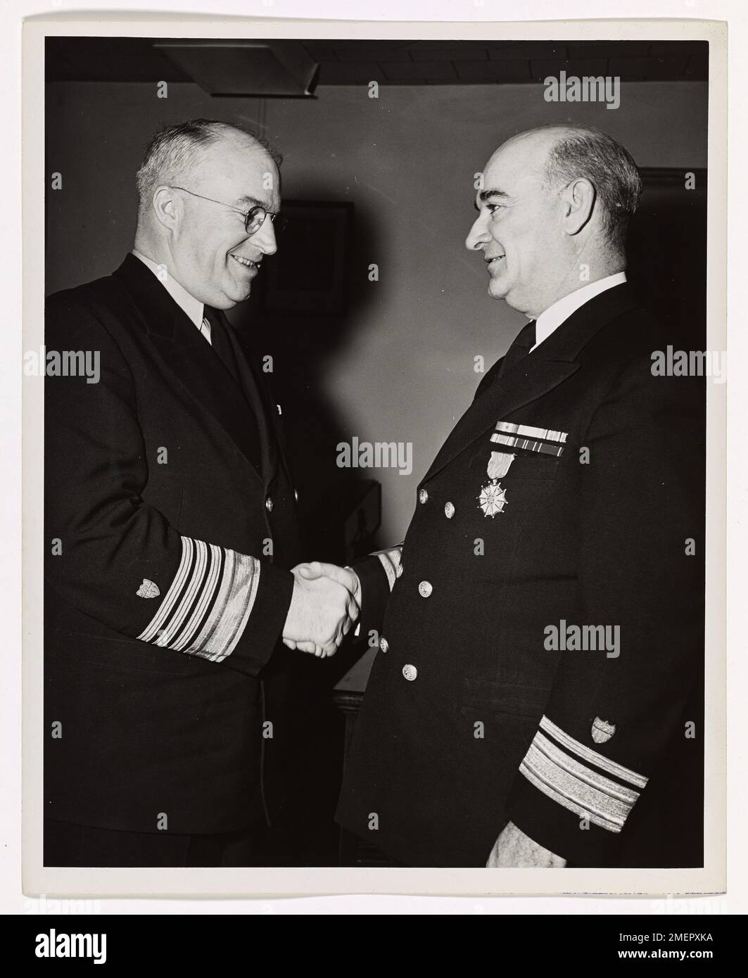 Admiral Joseph F. Farley, USCG, presents the Legion of Merit to Rear ...
