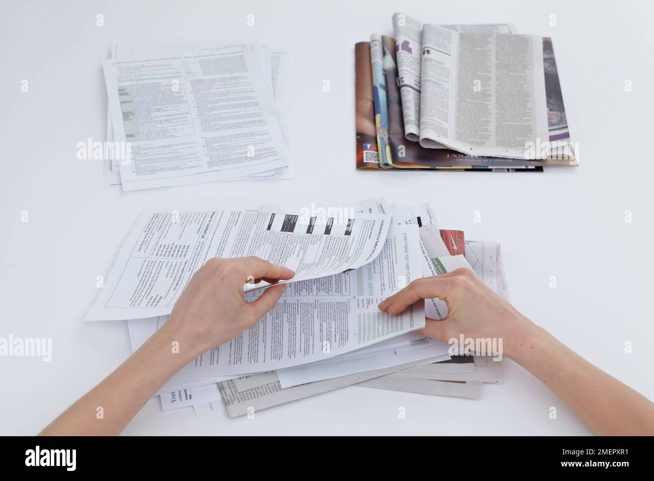 Selecting paper suitable for paper making, close-up Stock Photo - Alamy