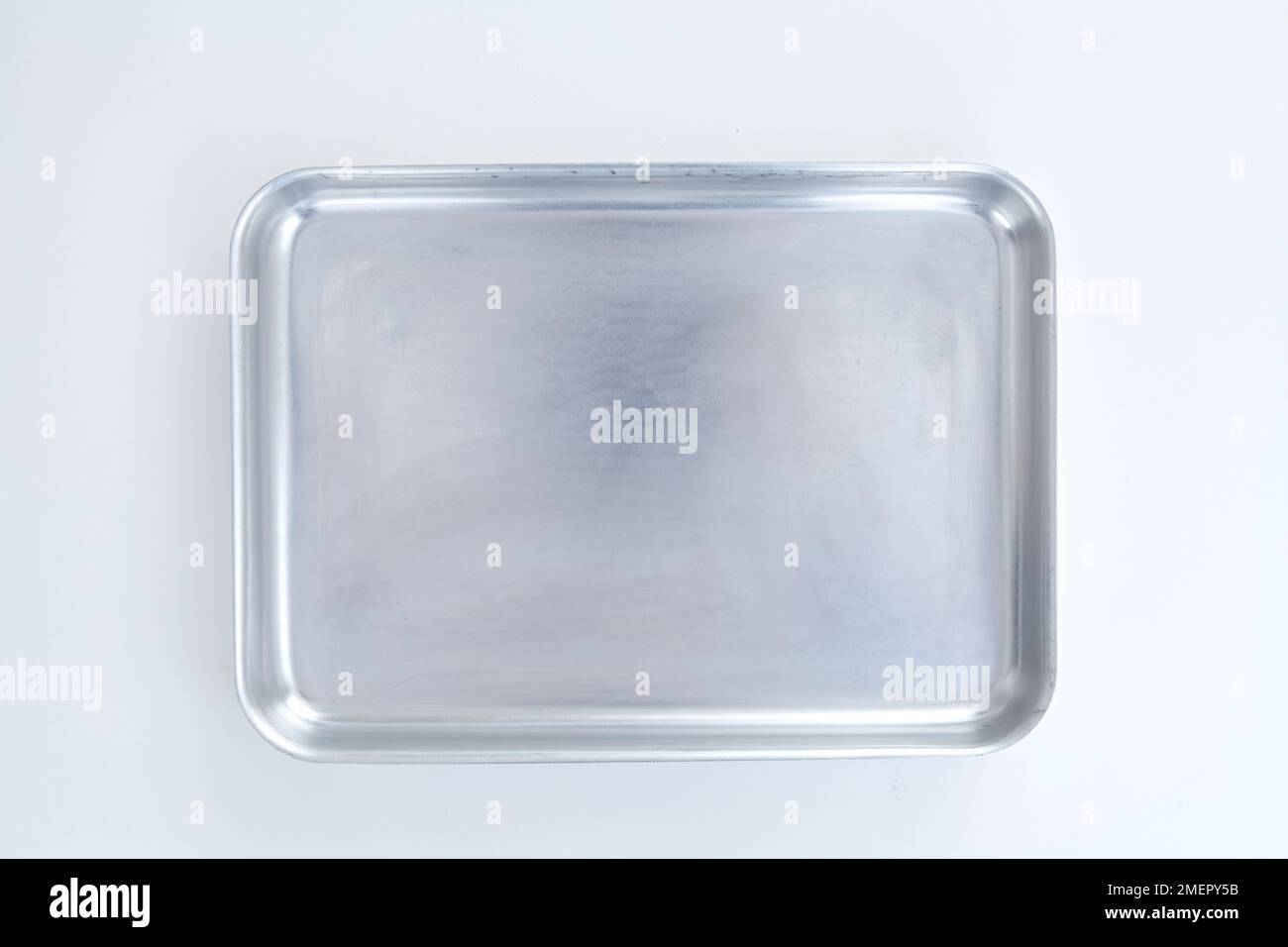 Large, shallow, stainless steel tray, overhead view Stock Photo - Alamy