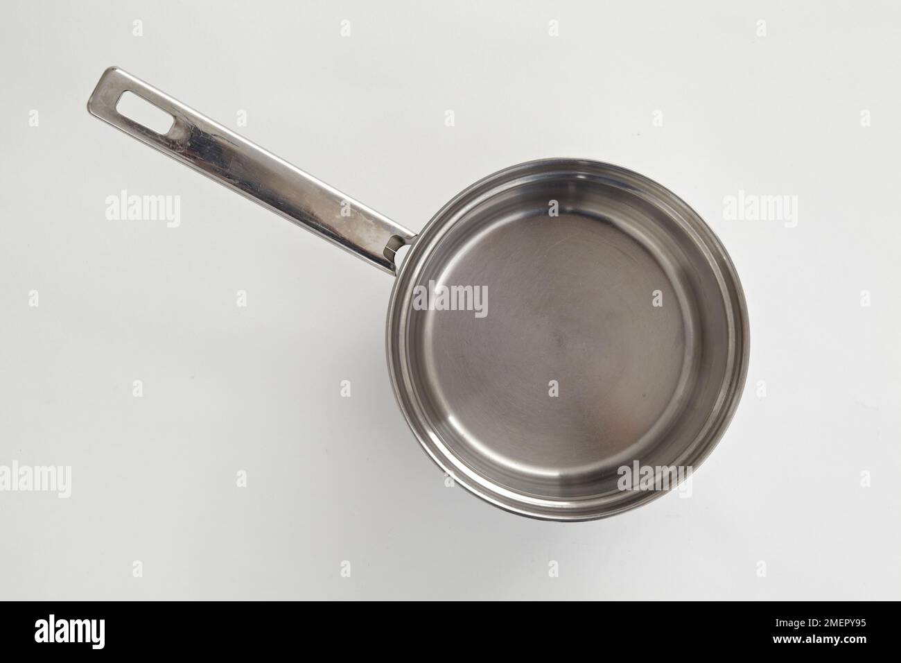 Stainless steel saucepan, overhead view Stock Photo - Alamy