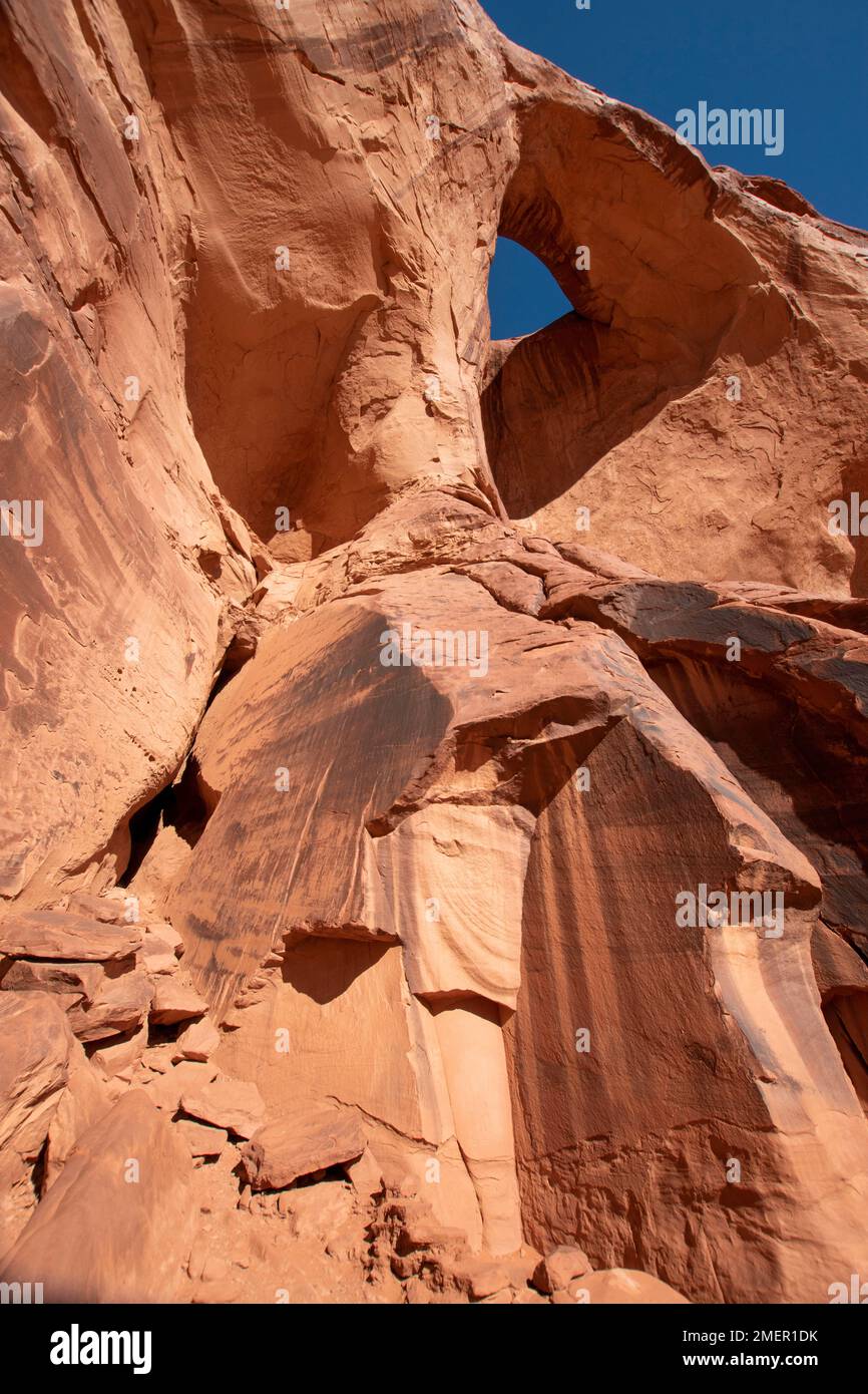 Sun's Eye is one of the natural stone arches in Monument Valley, AZ ...