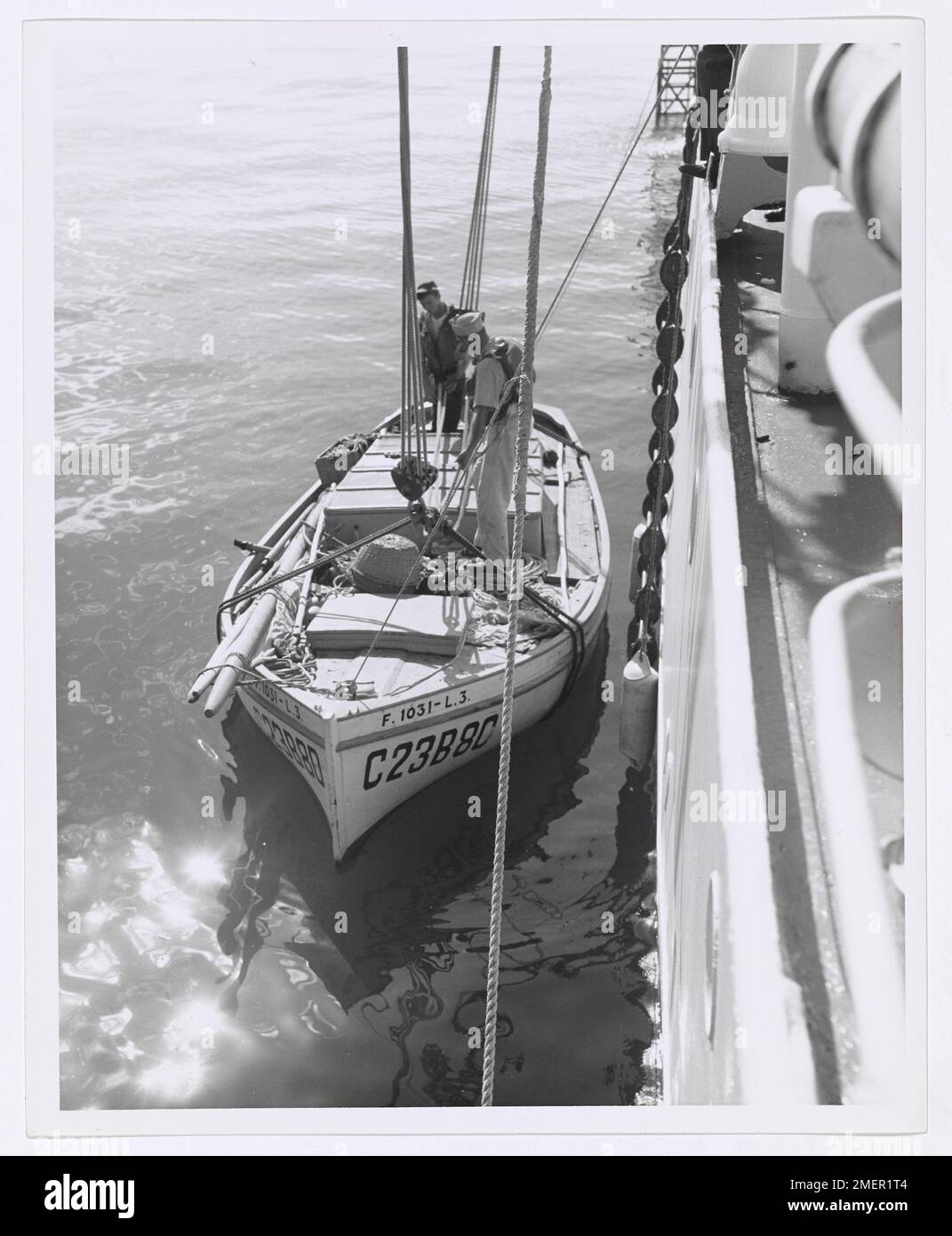 This image shows Cuban refugees being rescued by the U.S. Coast Guard ...