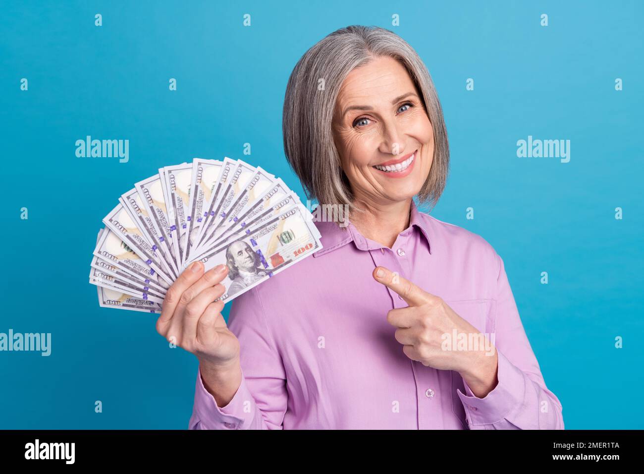 Photo of successful rich positive lady wear trendy clothes demonstrates ...