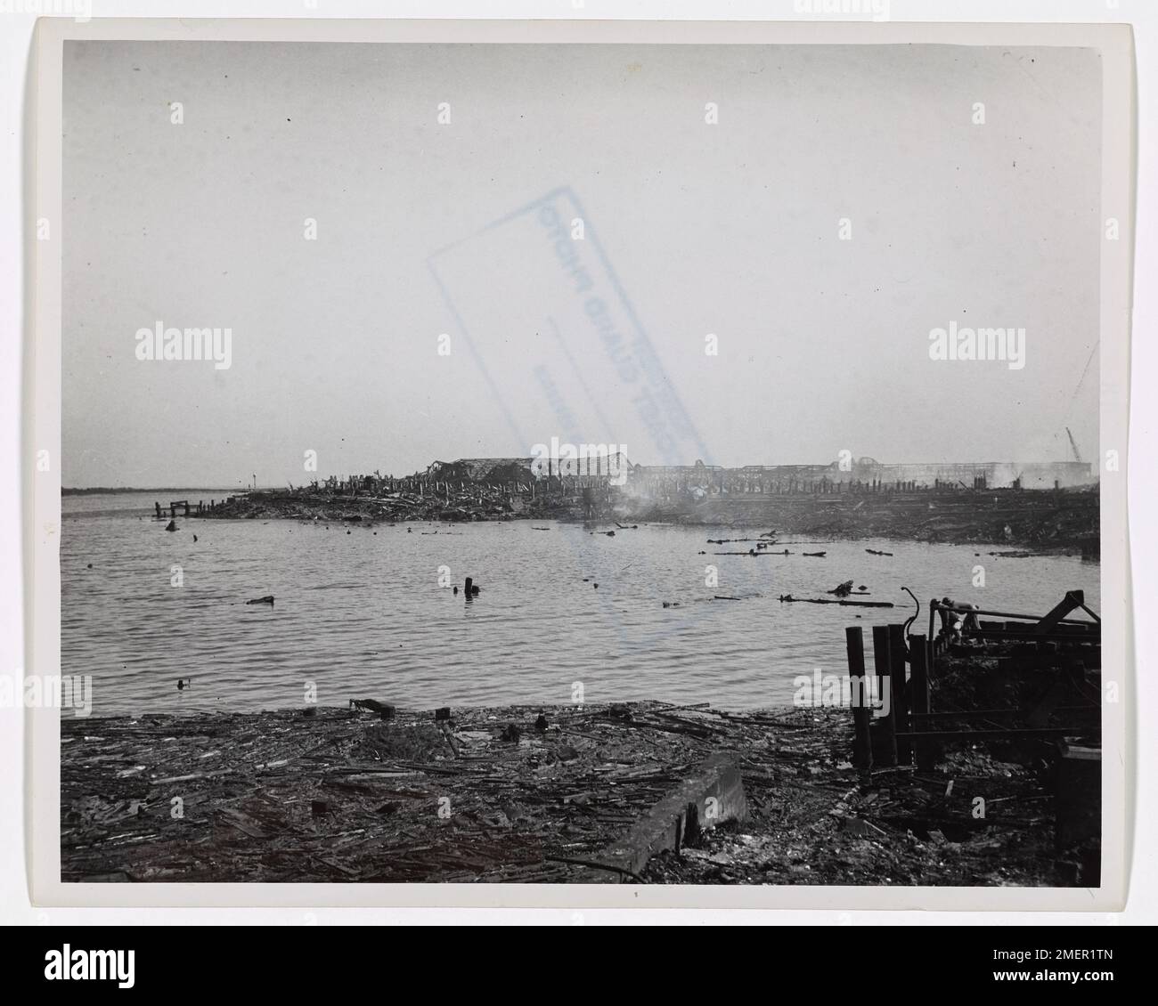 The aftermath of the Grandcamp explosion is shown, highlighting the ...