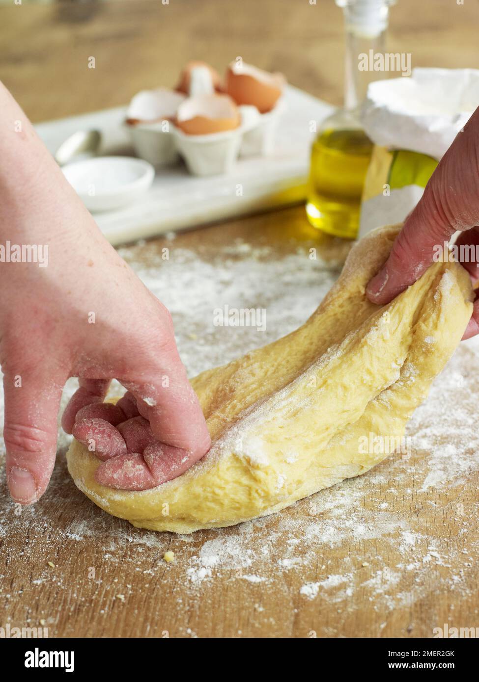Kneading pasta dough Stock Photo - Alamy