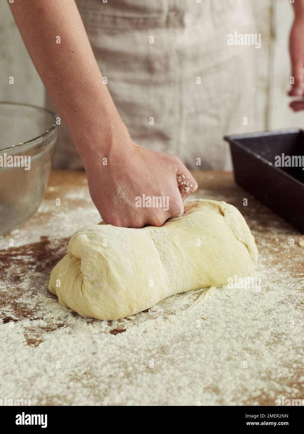 Women hand kneading dough on hi-res stock photography and images - Alamy