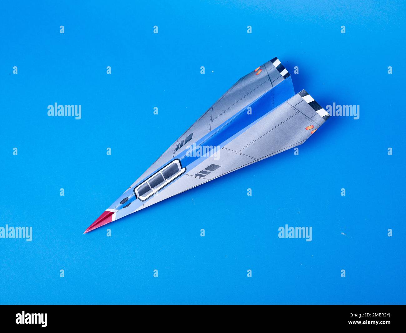 Paper plane fighter jet Stock Photo - Alamy