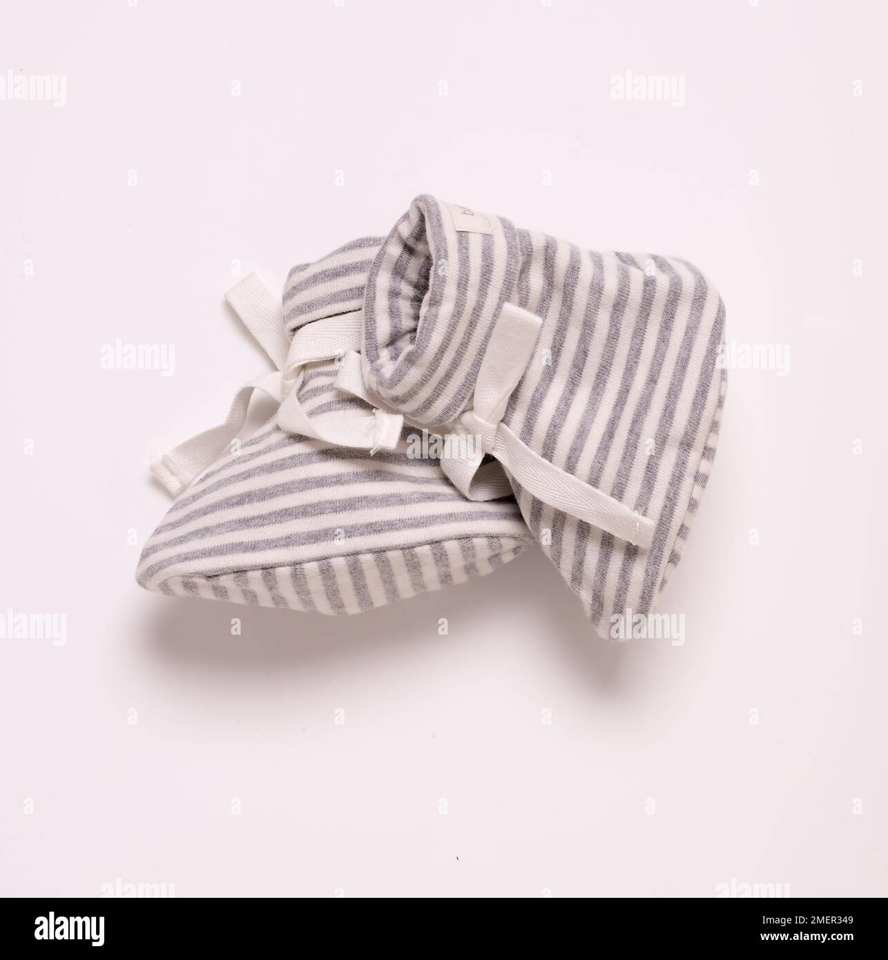 Striped baby booties Stock Photo - Alamy