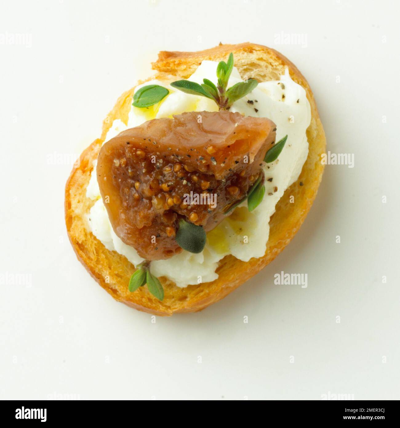 Fig and cheese crostini, canape Stock Photo - Alamy