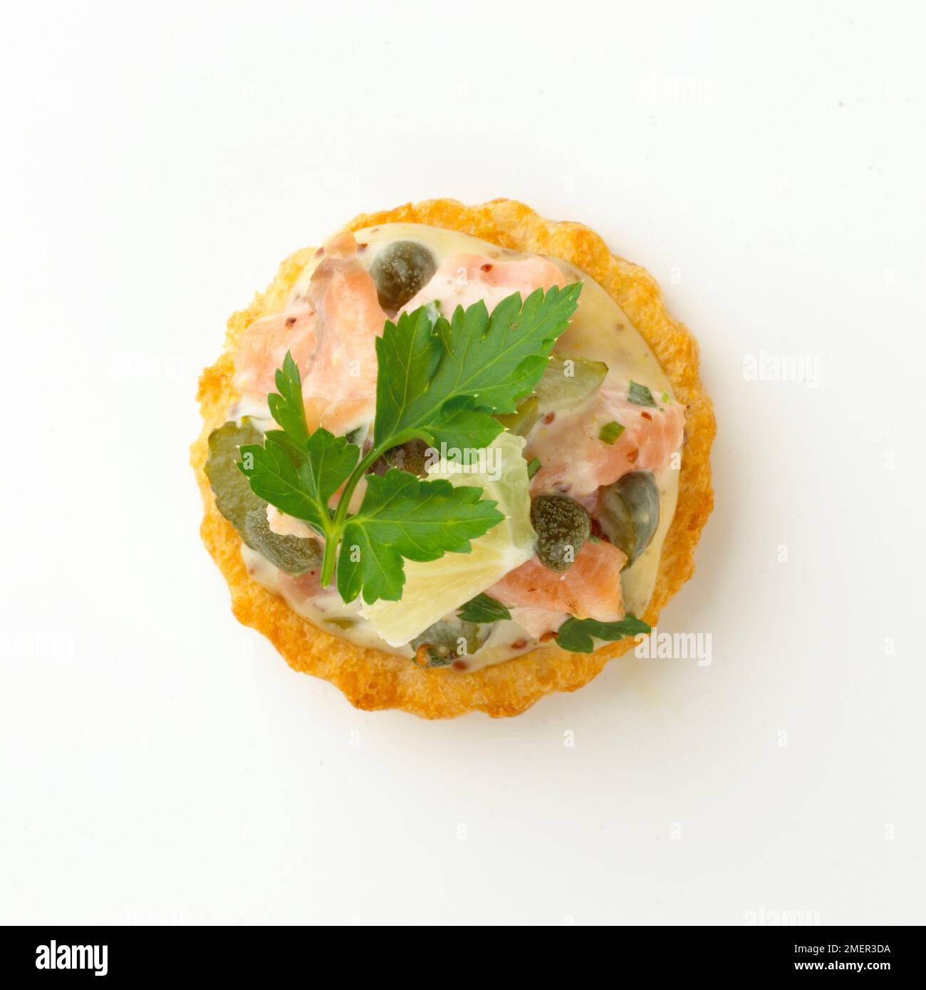 Salmon tartare croute with capers, canape Stock Photo - Alamy