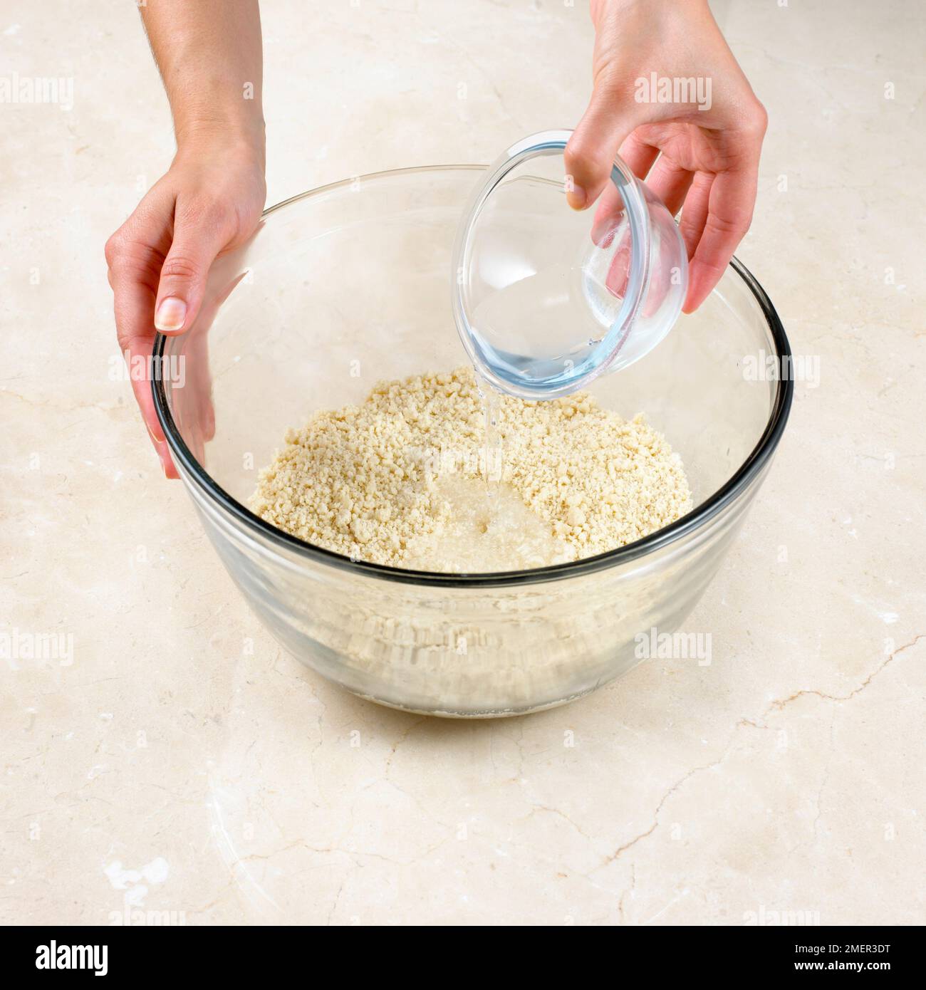 Adding the water hi-res stock photography and images - Alamy