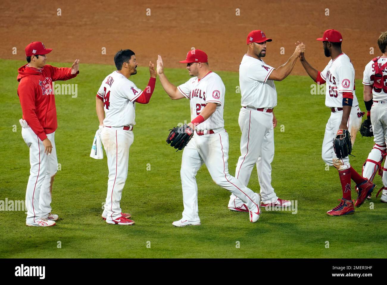 The Los Angeles Angels celebrate after a win over the Houston Astros ...