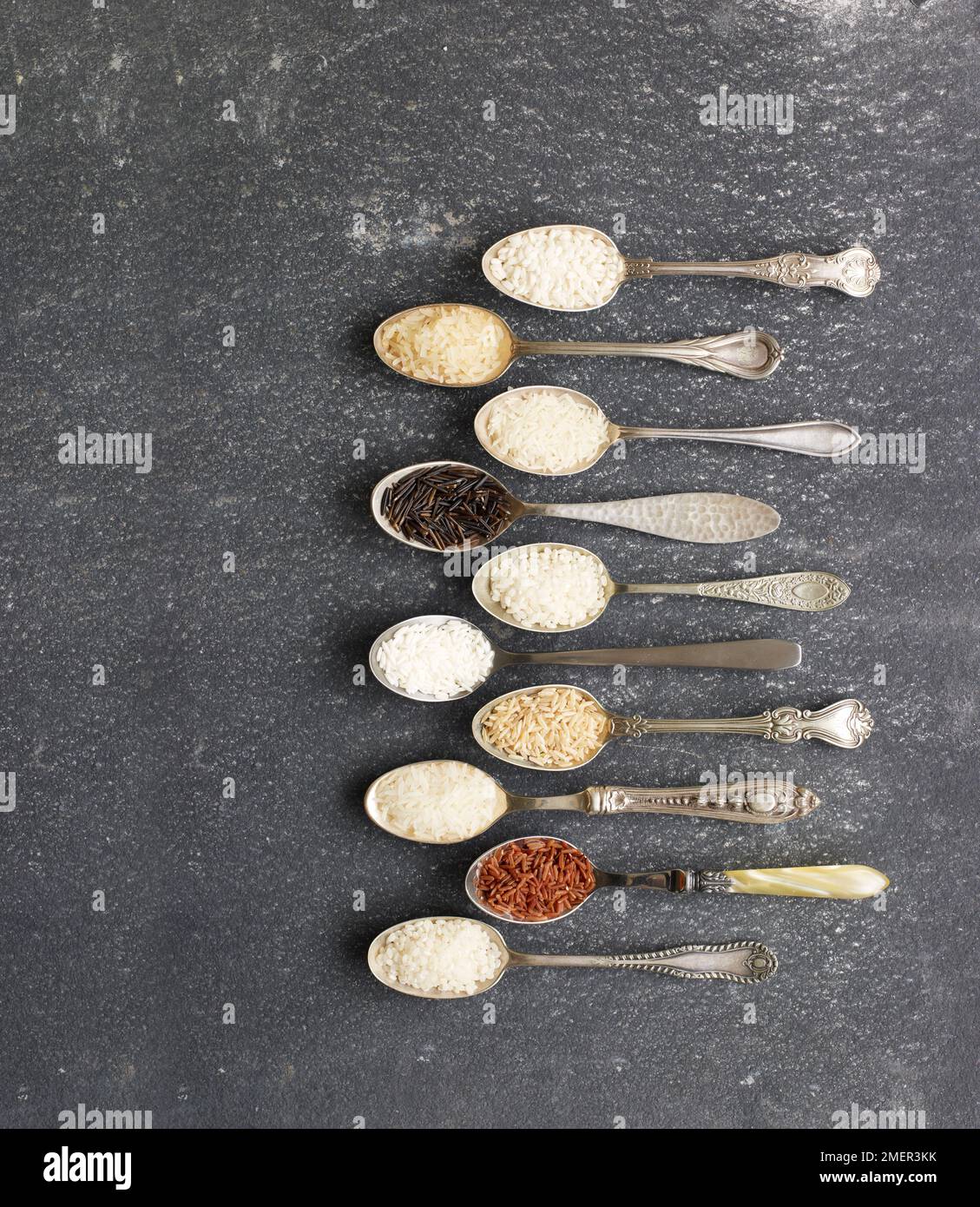 Spoons containing different types of rice, risotto rice, long-grain ...