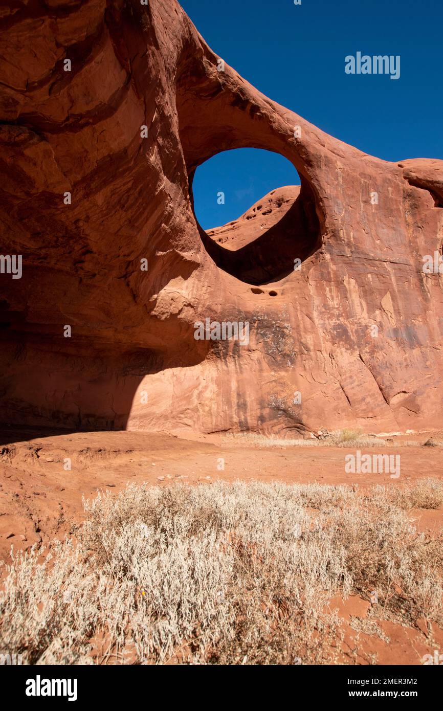Moccasin Arch is one of many natural stone arches in Monument Valley ...