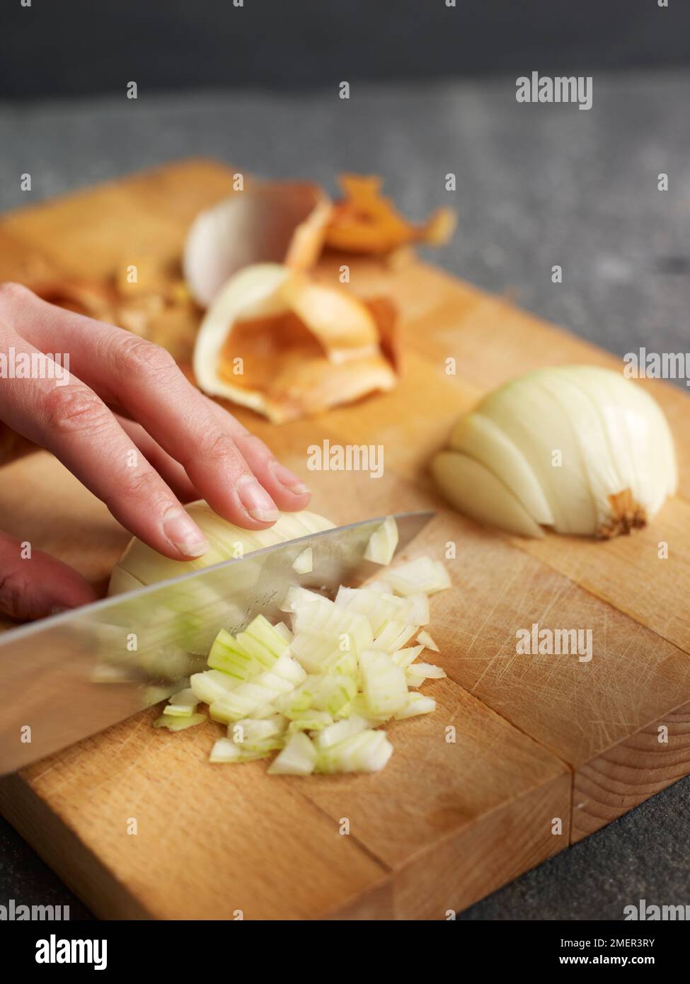 Woman onions studio hi-res stock photography and images - Alamy