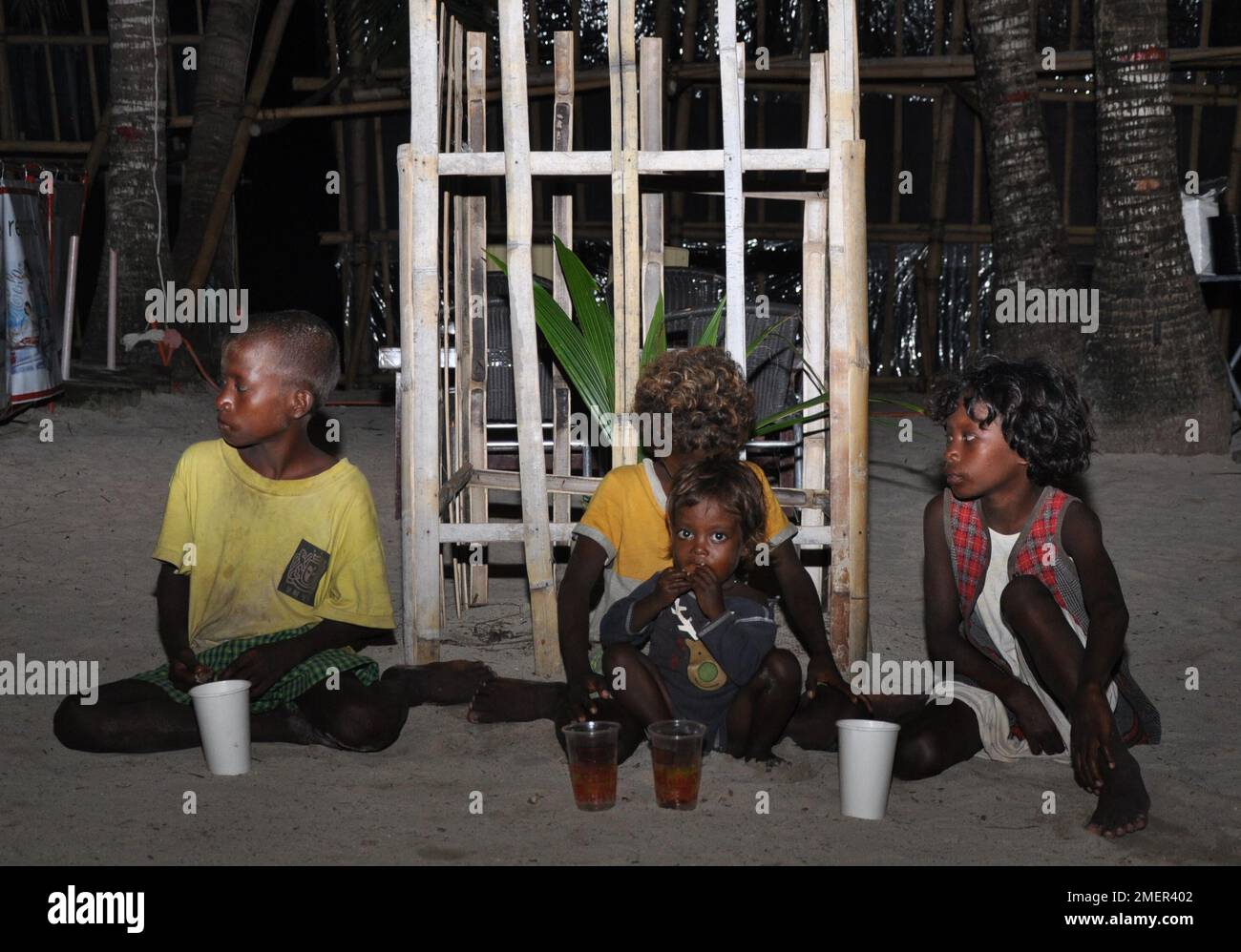 A view of Aetas a Negrito ethnic children sitting on sand Stock Photo ...