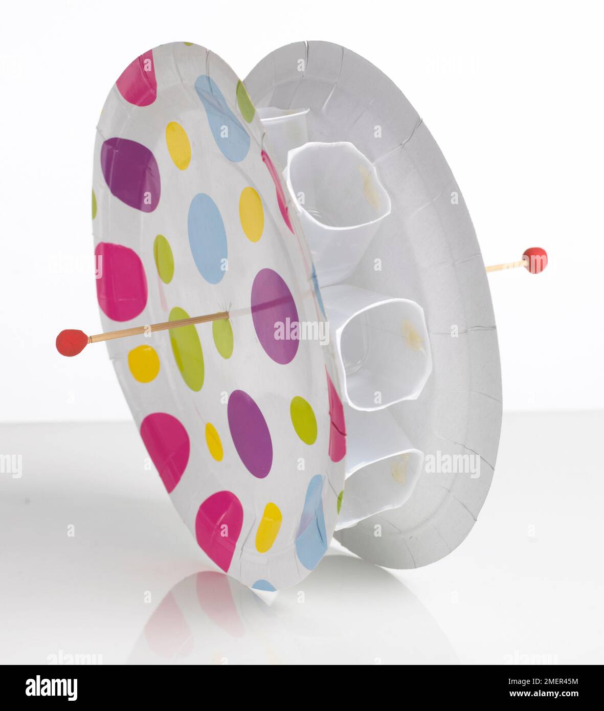 Wheel made from plastic cups sandwiched between two paper plates, to ...