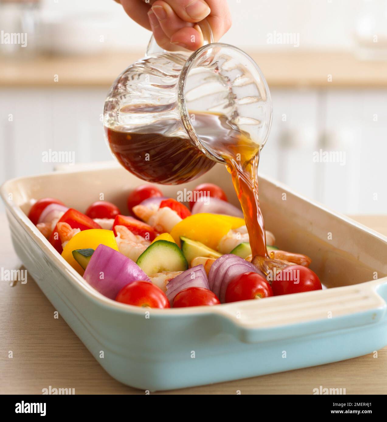 Pouring peppers hi-res stock photography and images - Alamy