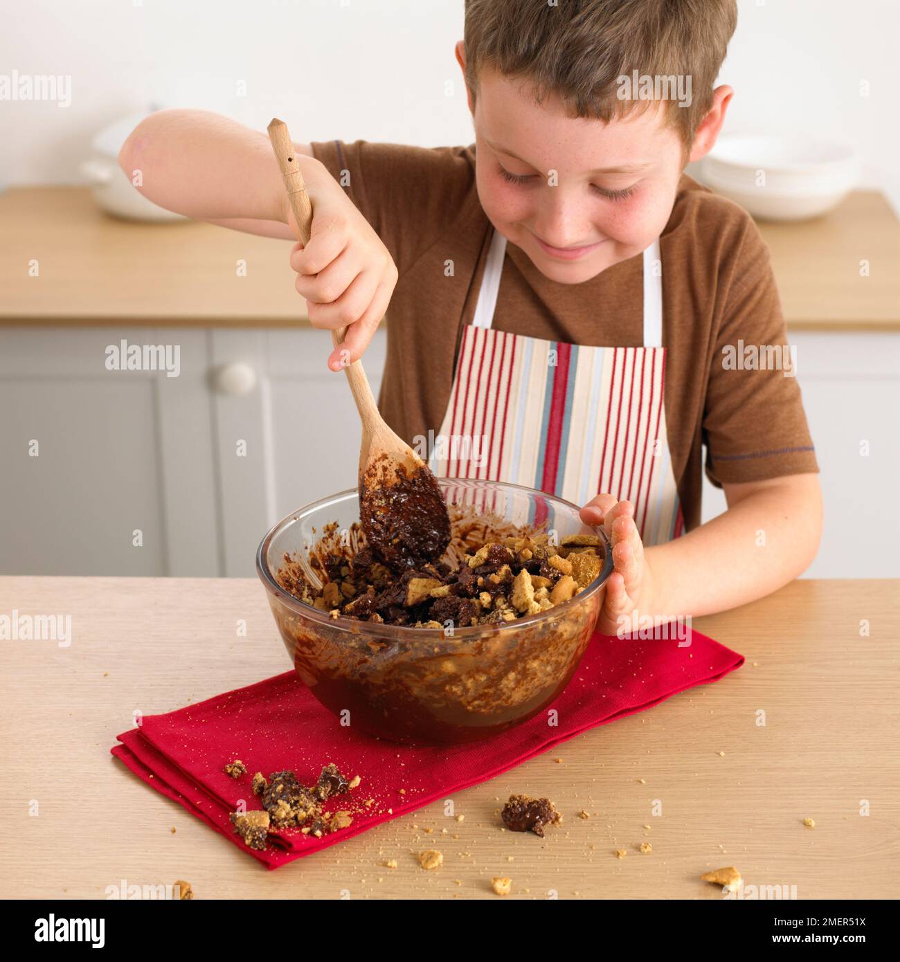 Child mixing stirring chocolate hi-res stock photography and images - Alamy