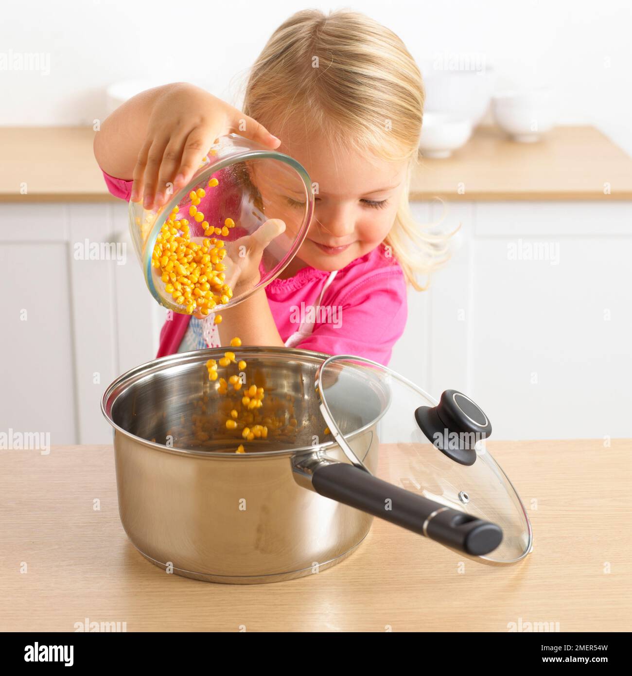 Tipping bowl hi-res stock photography and images - Alamy