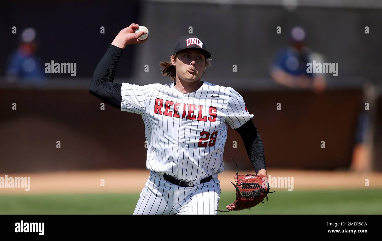 UNLV pitcher Bradley Spooner (26) throws to first during an NCAA ...