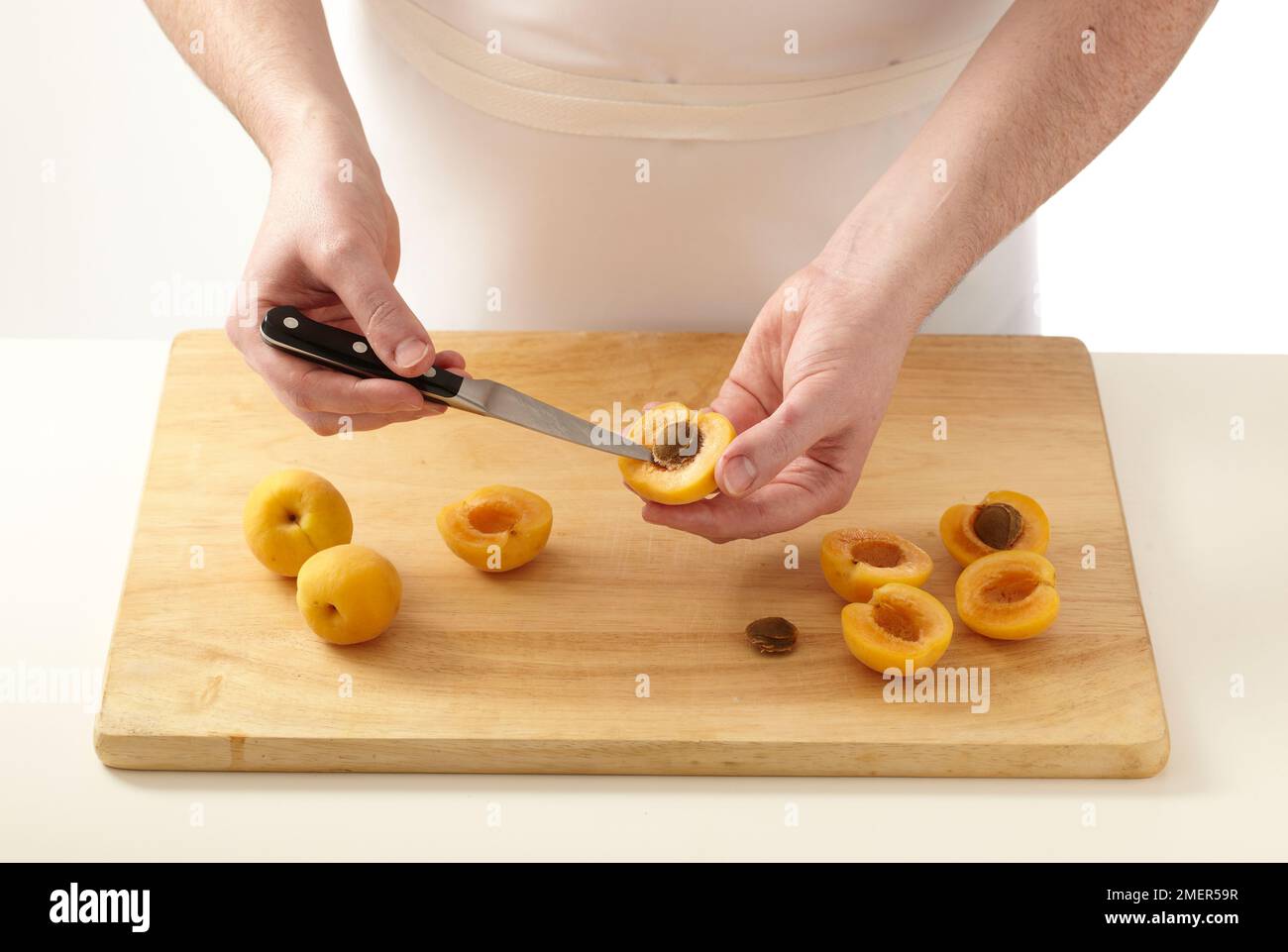Cutting apricots hi-res stock photography and images - Alamy
