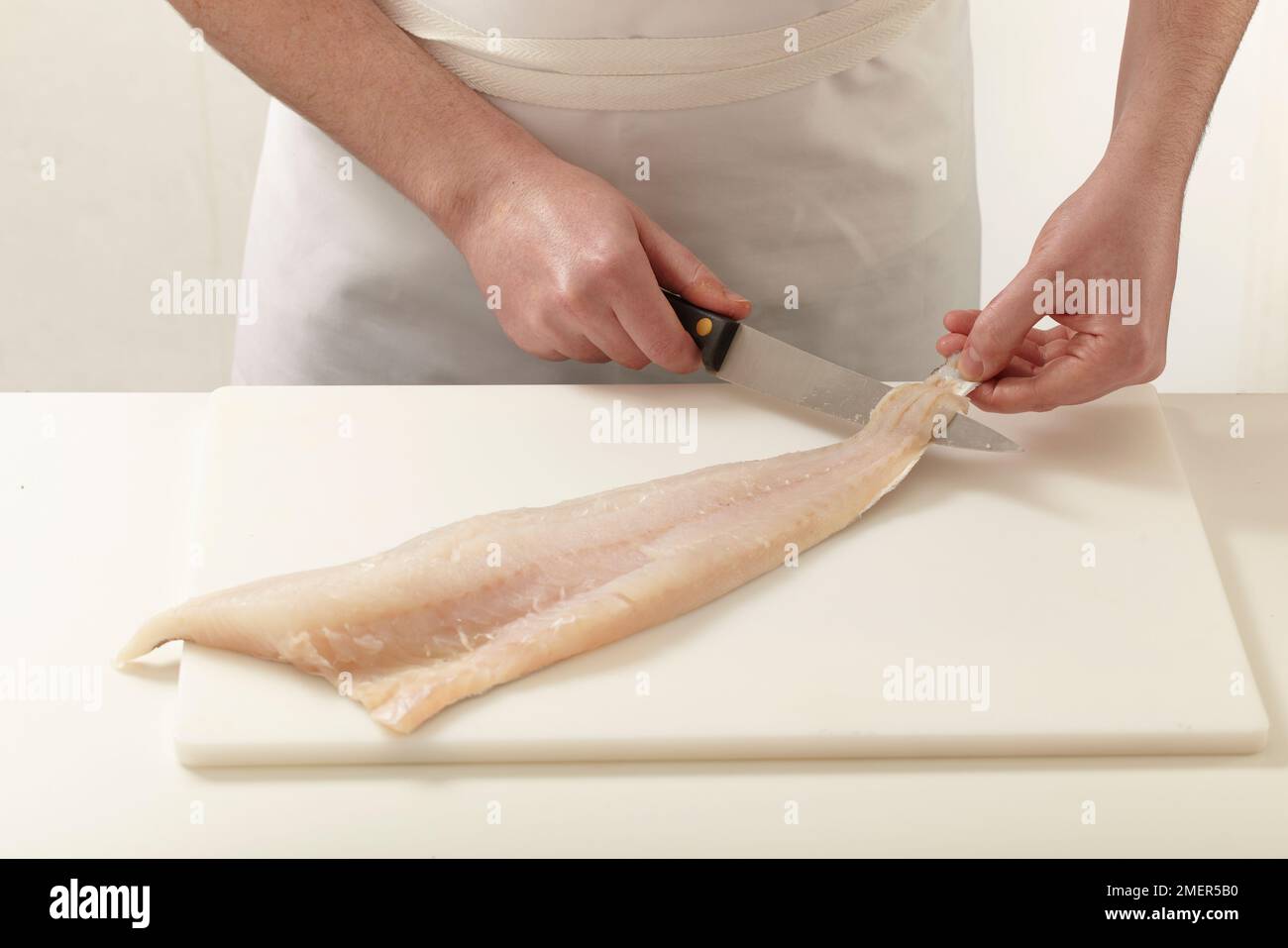 Skinning fish hi-res stock photography and images - Alamy