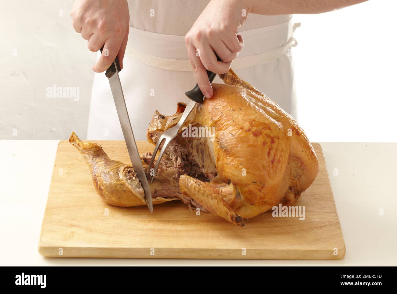 Carving a roast turkey Stock Photo - Alamy