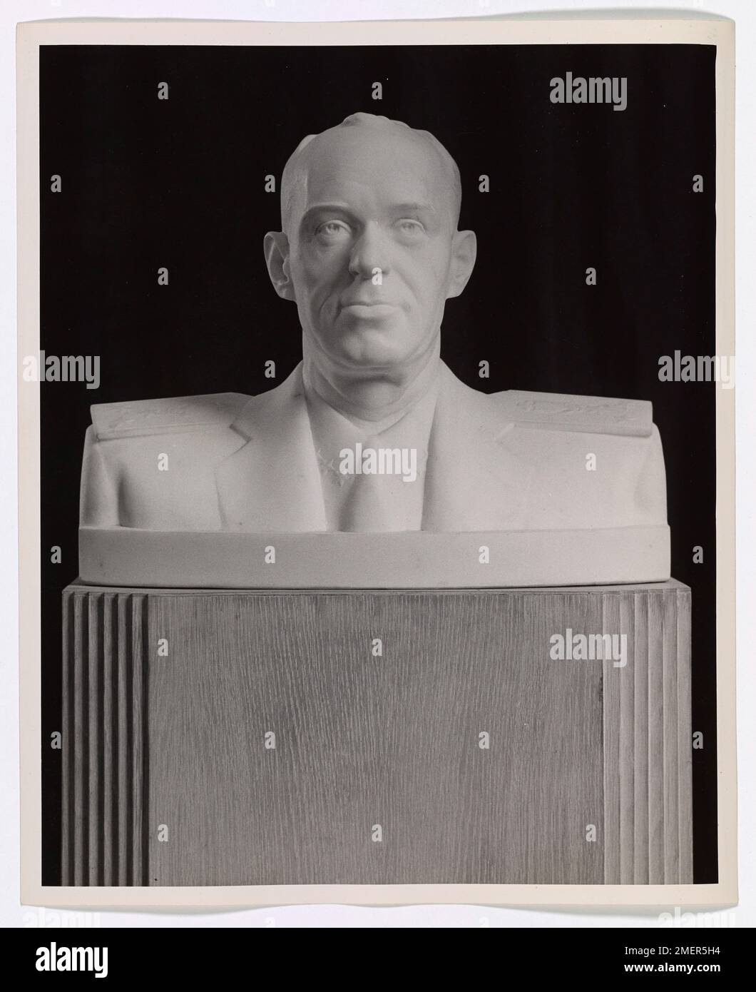 This photograph depicts the bust of Admiral Russell R. Waesche, located ...