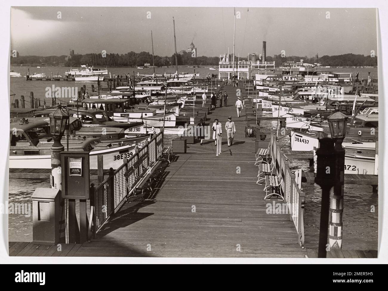 A photograph captures the scenic dock of the Detroit Yacht Club ...