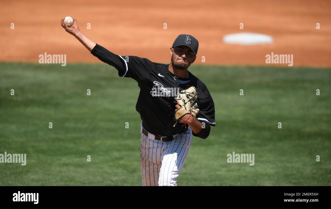 Long Beach's Luis Ramirez delivers during an NCAA baseball game against ...