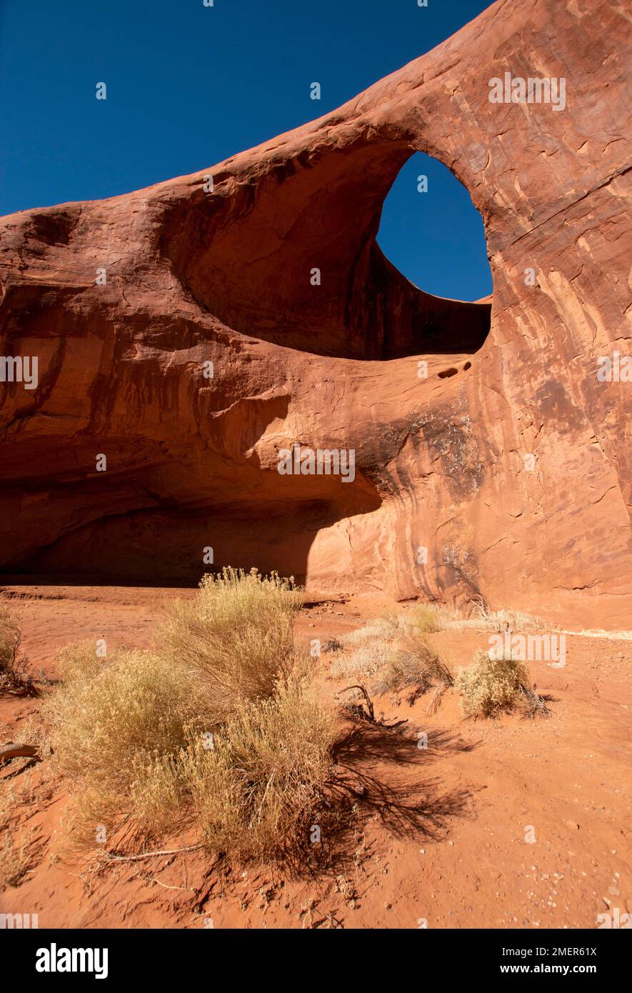 Moccasin Arch is one of many natural stone arches in Monument Valley ...