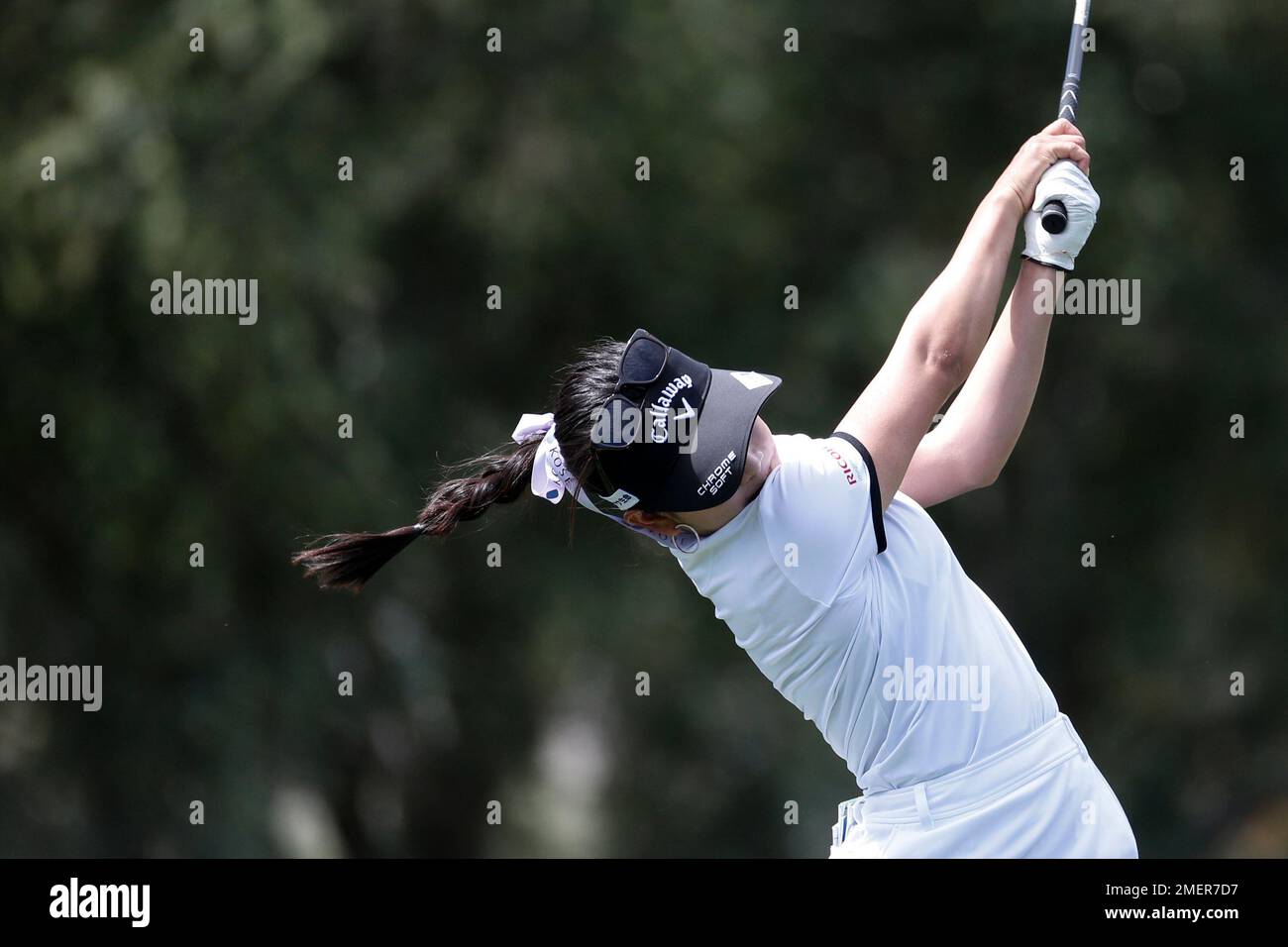 Yui Kawamoto of Japan hits from the eighth tee during the final round ...
