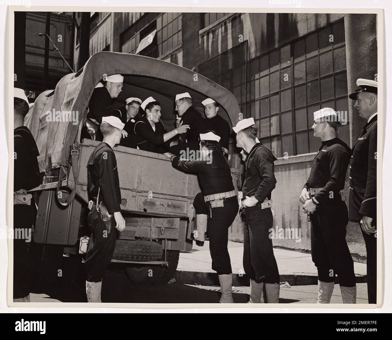 Members of the Captain of the Port Battalion board a vessel to replace ...