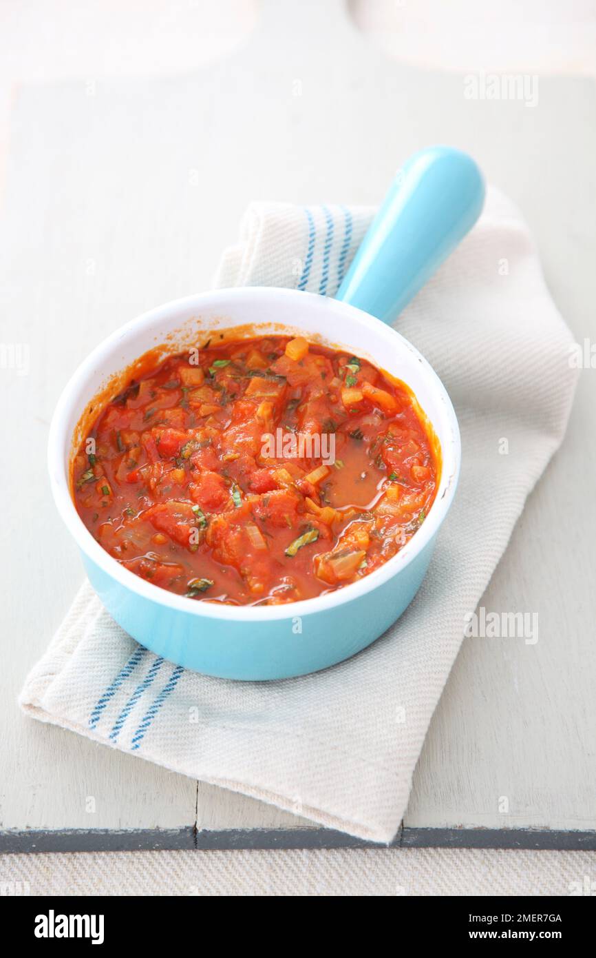 Slow-cooked tomato sauce Stock Photo - Alamy