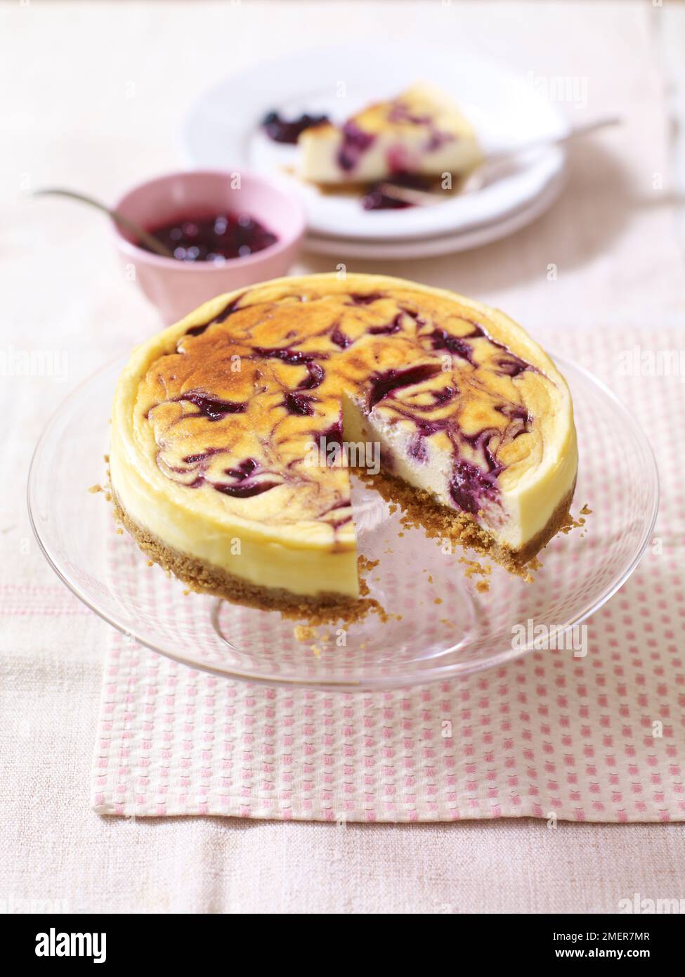 Blueberry ripple cheesecake Stock Photo - Alamy