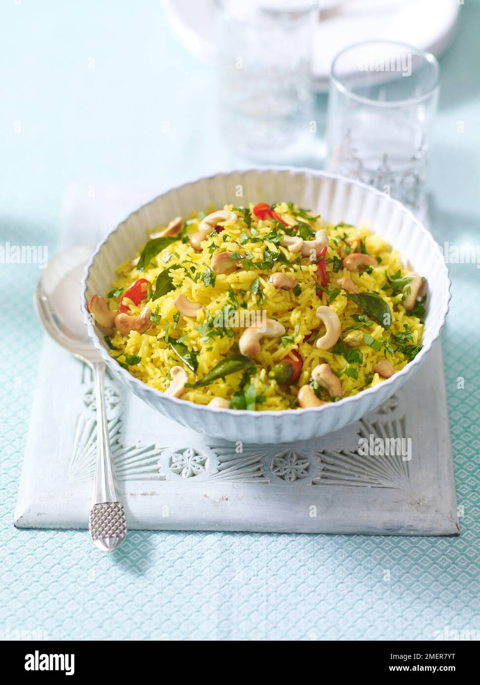 Bowl of lemon rice with cashew nuts Stock Photo - Alamy