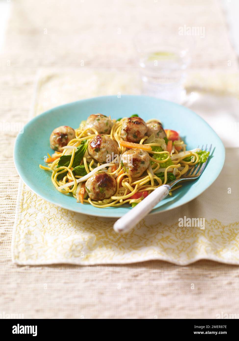 Spaghetti with spicy chicken meatballs Stock Photo - Alamy