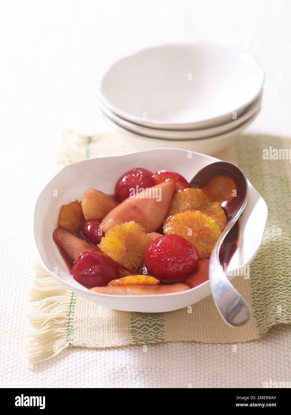 Bowl of stewed winter fruits Stock Photo - Alamy