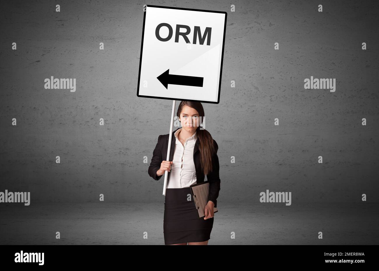 business person holding a traffic sign Stock Photo - Alamy