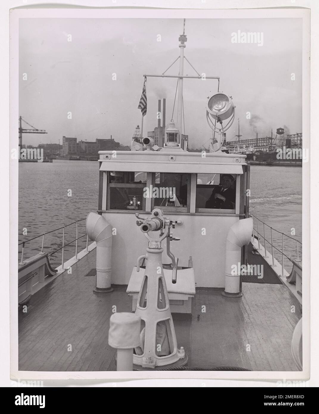 This image depicts a vessel on patrol, likely operated by the Coast ...